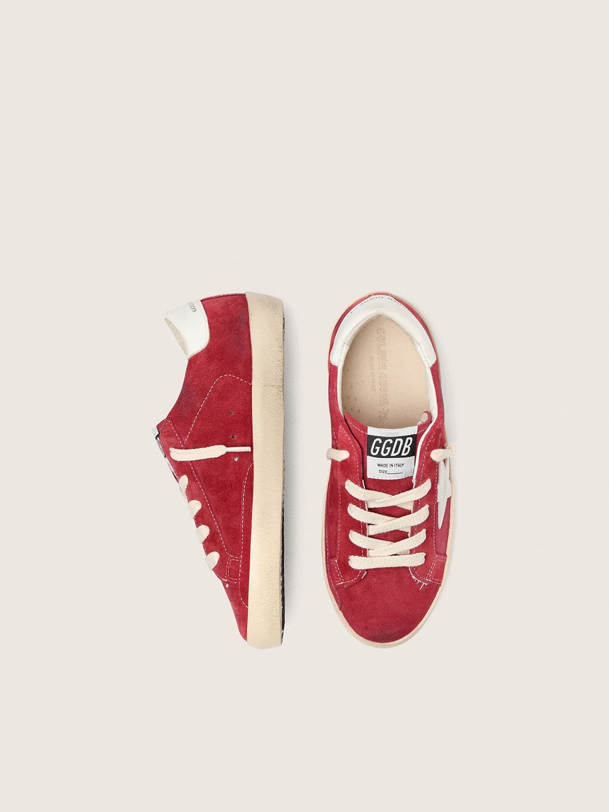 Junior Super-Star in red suede with white leather star and heel tab