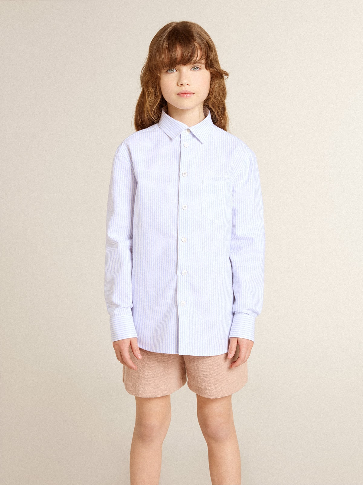 Girls' striped shirt with embroidered lettering on the Girls' striped shirt with embroidered lettering on the