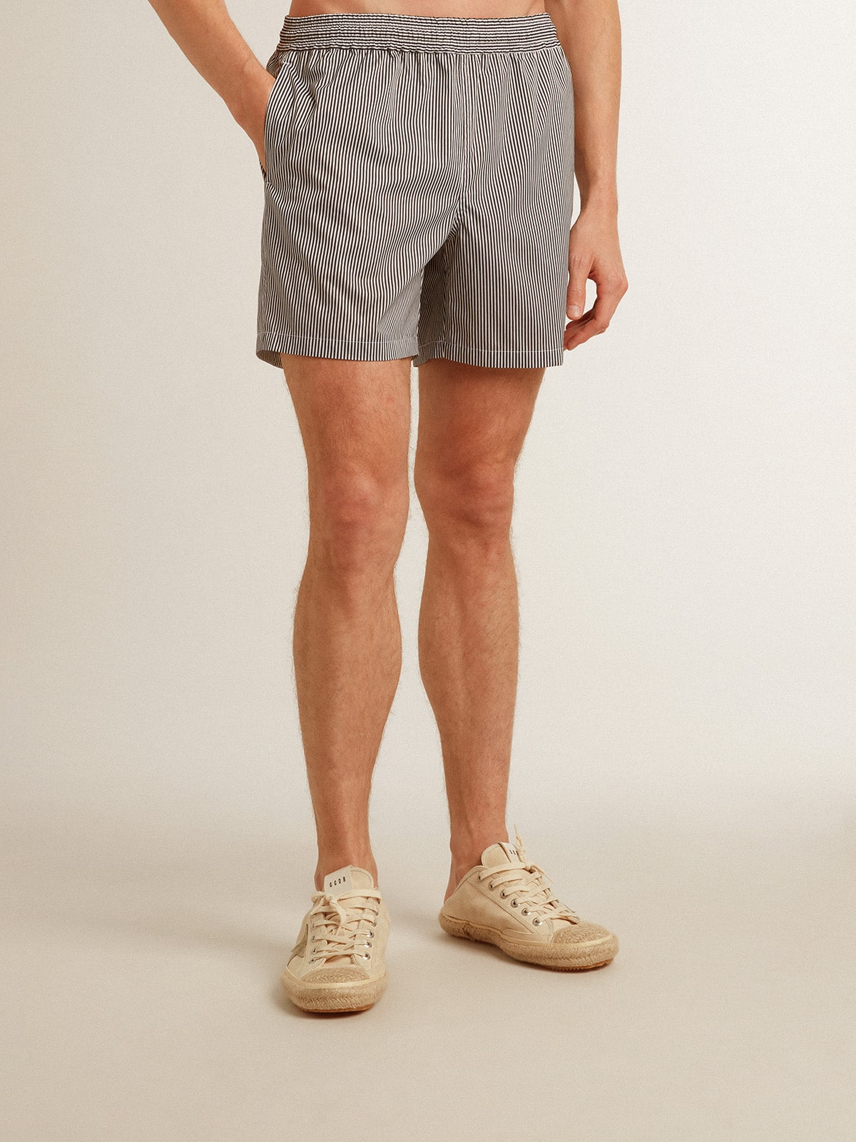 Swim shorts in blue and white striped technical fabric | Golden Goose