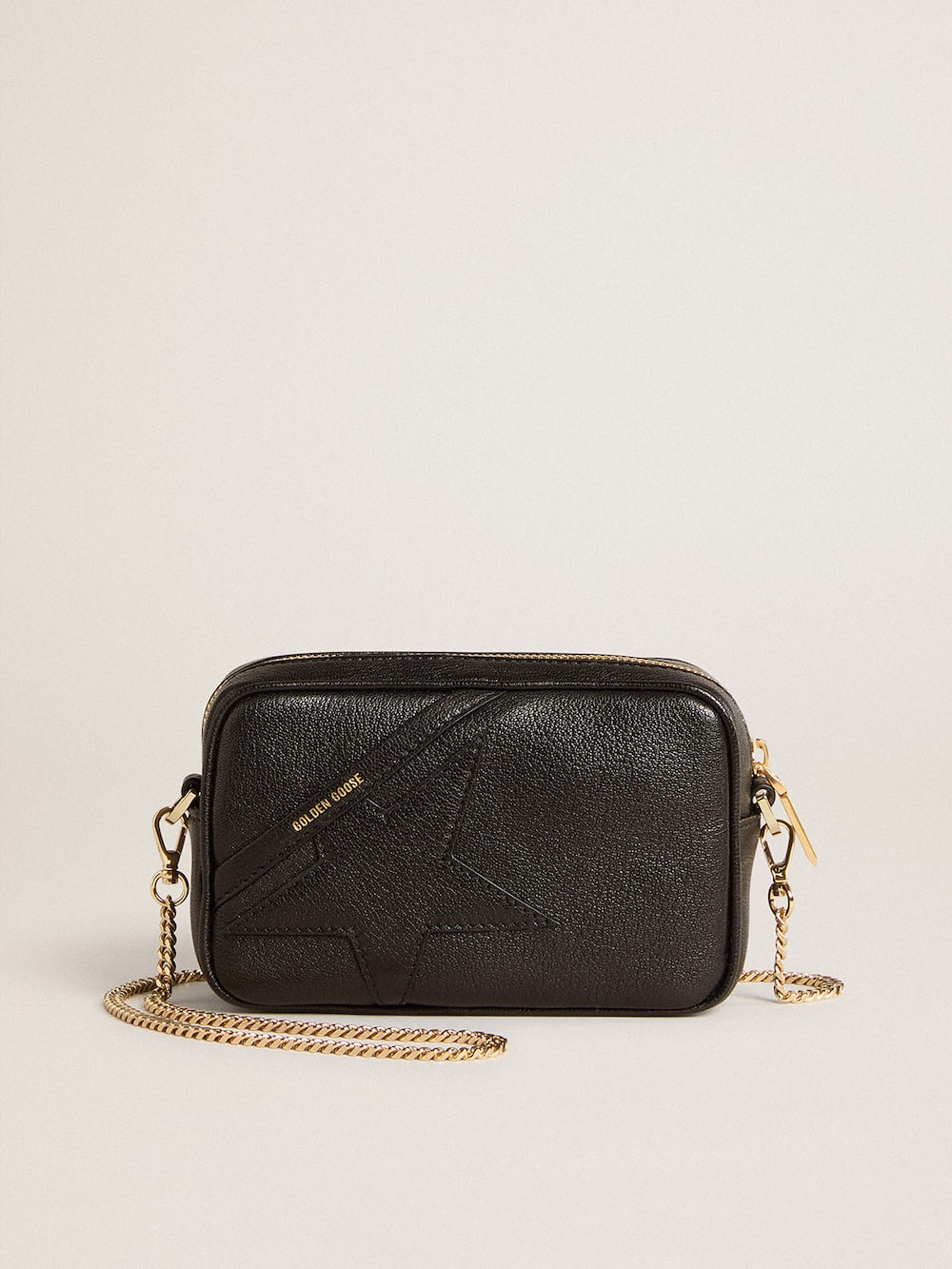 Mini Star Bag in black leather with tone-on-tone star | Golden Goose