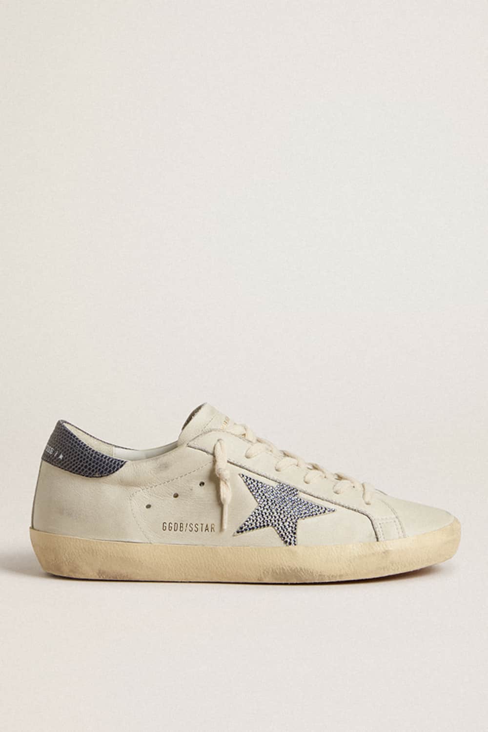 Super-Star LTD with blue leather star and detail with chains and pearls ...