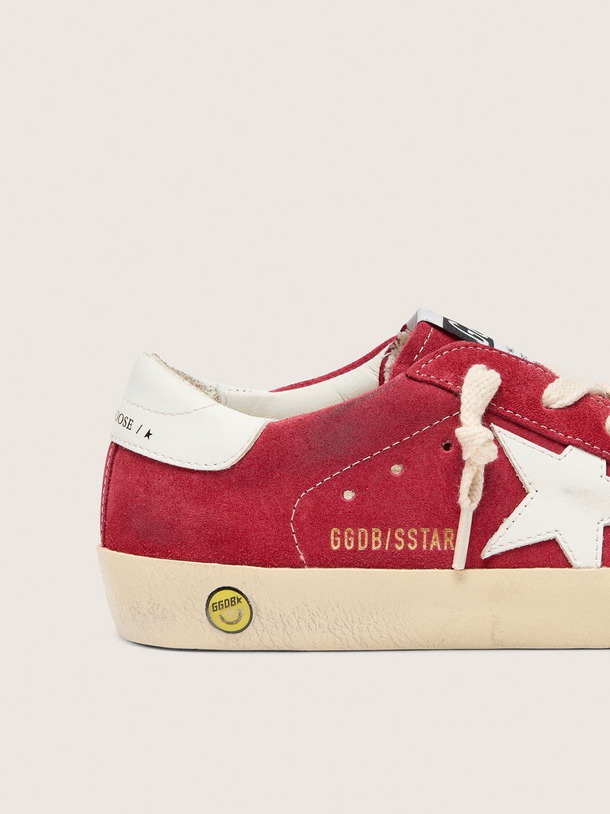 Young Super-Star in red suede with white leather star and heel tab